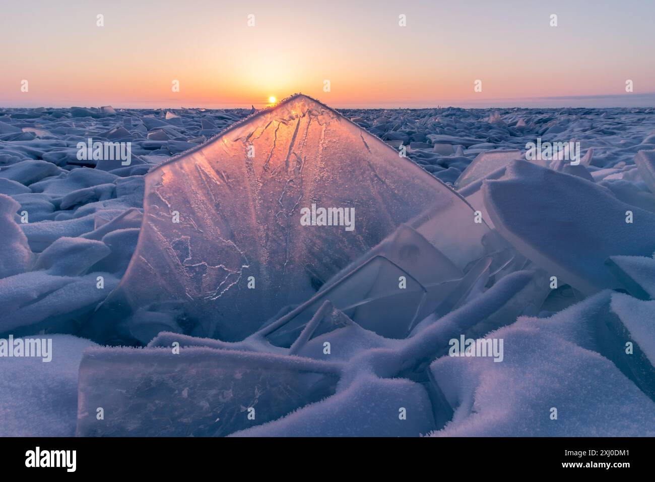Hummocks at sunrise. Sun light hits ice. Baikal Lake. Siberia, Russia ...