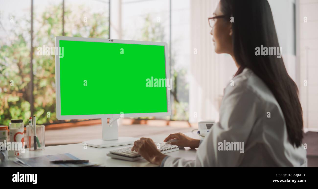 Female asian doctor green screen hi-res stock photography and images ...