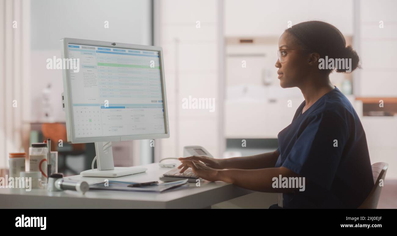 Portrait of a Black Female Medical Health Care Professional Working on ...