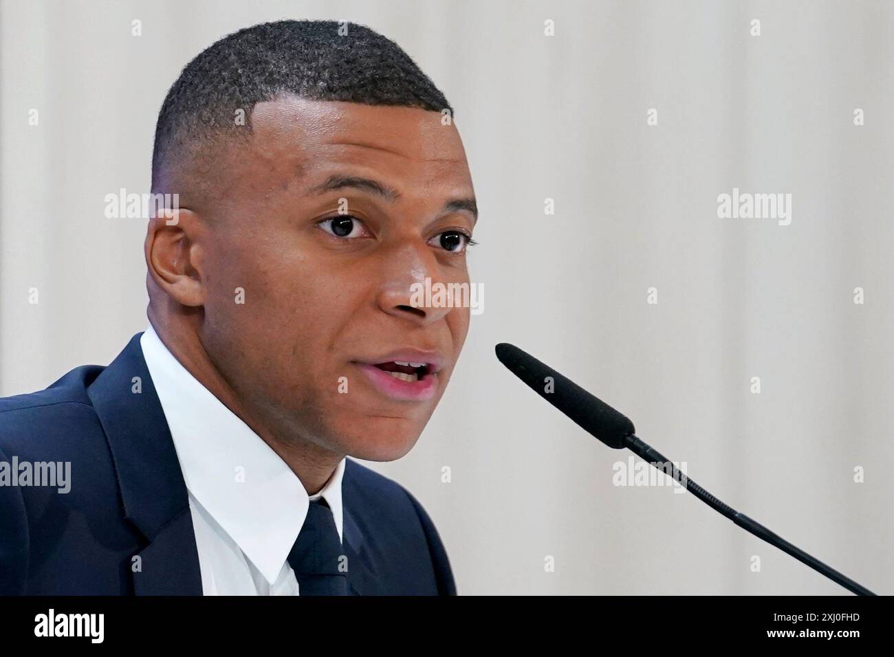 Kylian Mbappe, of France, speaks during a news conference after being ...