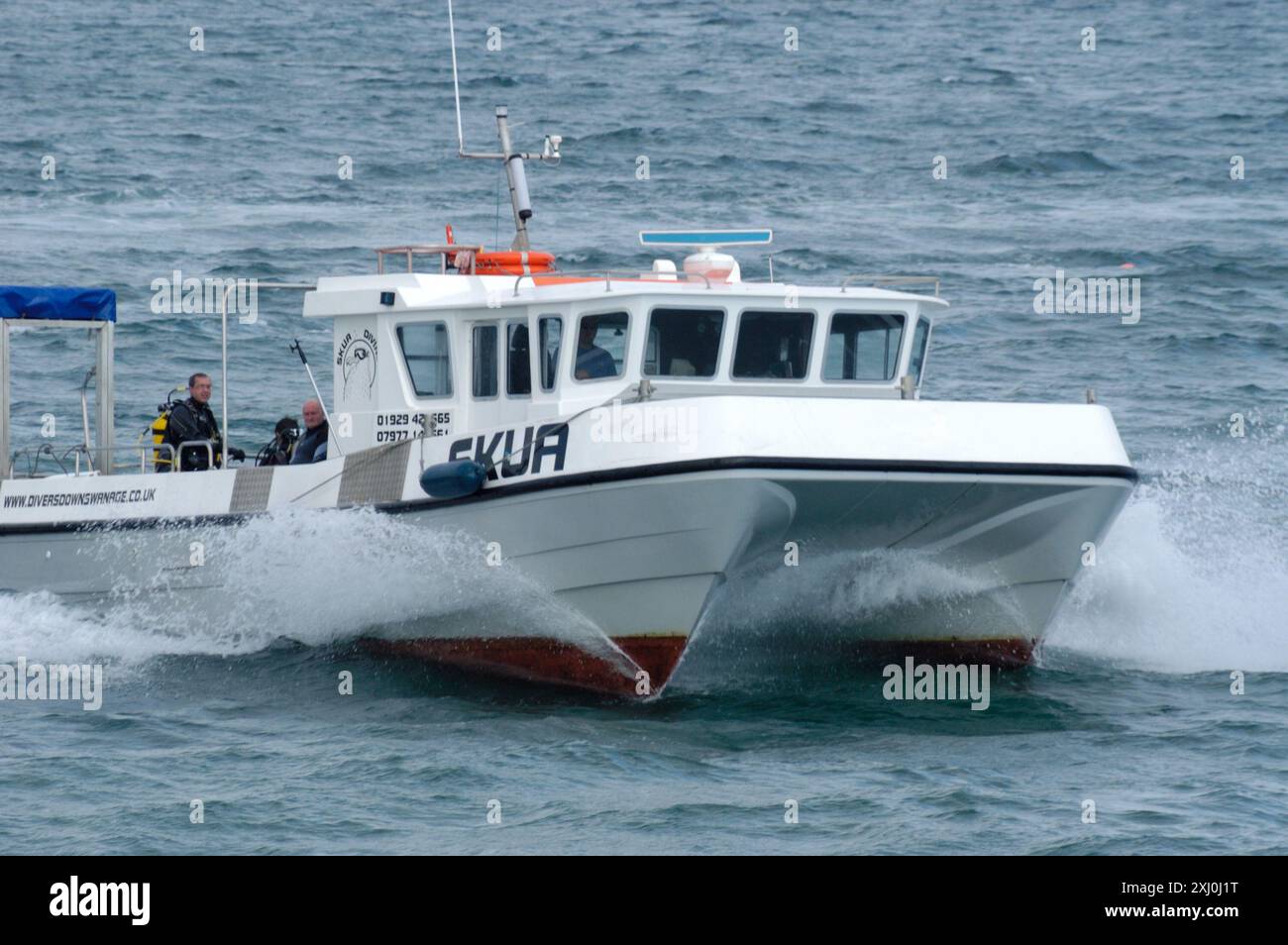 Catamaran taking Divers to their Diving Spot from Swanage Pier Dorset ...