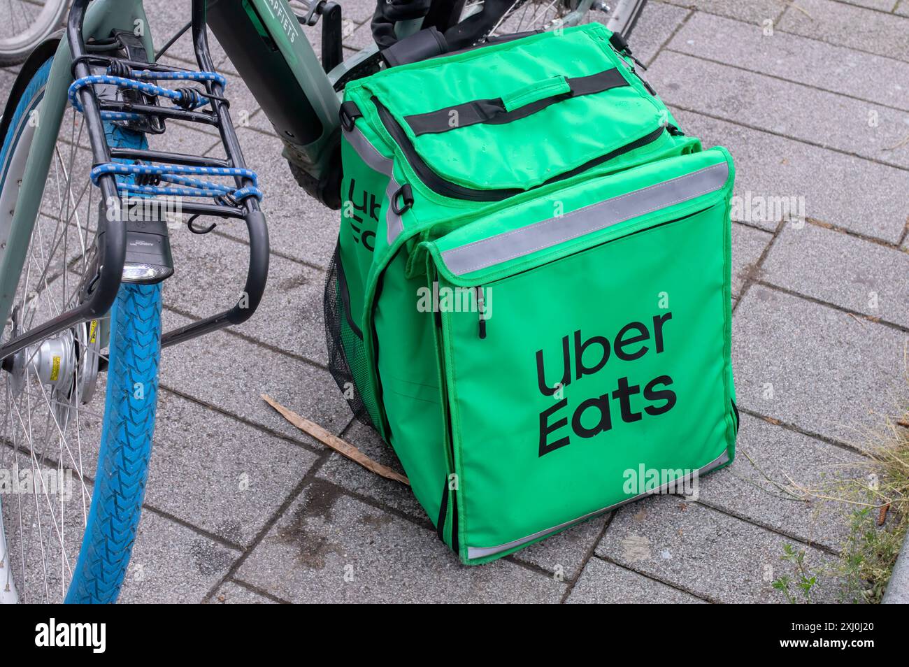 Uber Eats Bag At A Bicycle At Amsterdam The Netherlands 10-7-2024 Stock ...