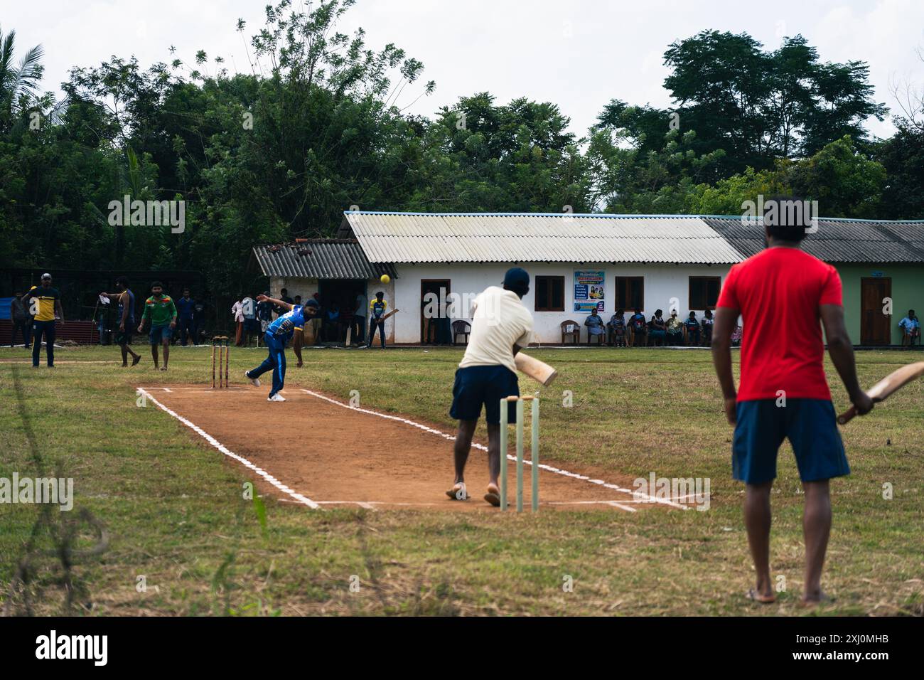 Sri Lankan young village people playing cricket. Sri Lanka, Sigiriya ...