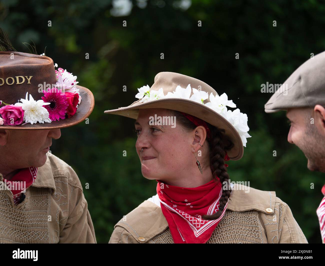 The first female bearer of the chair carrying the contestants into and ...