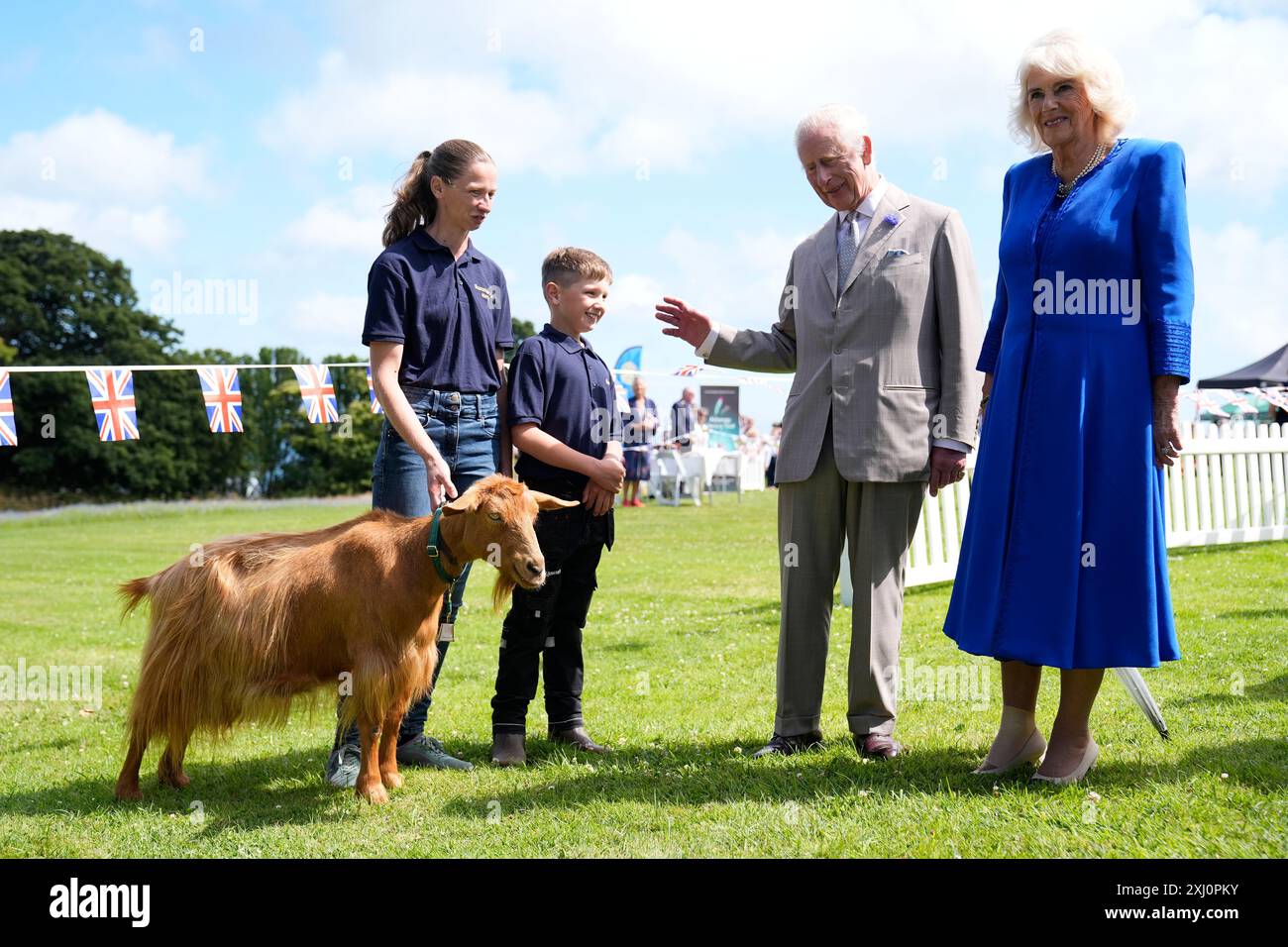 King Charles III and Queen Camilla viewing rare Golden Guernsey Goats ...