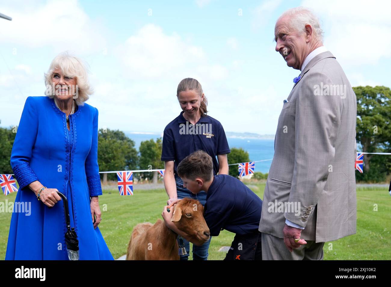King Charles III and Queen Camilla viewing rare Golden Guernsey Goats ...