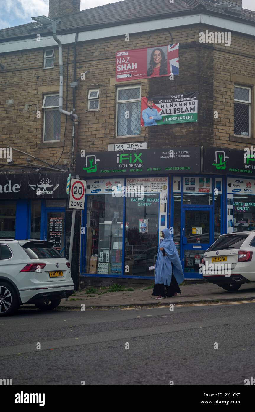UK General Election 2024. Campaign posters in Bradford West ...