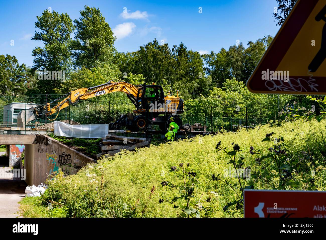 Work being performed on the metro track in Myllypuro, at an underpass ...