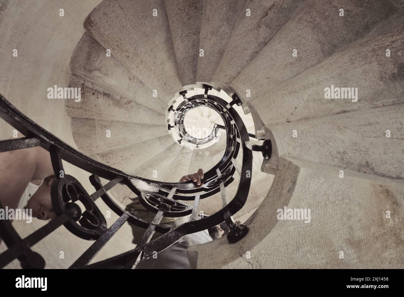 Climbing a spiral staircase hi-res stock photography and images - Alamy