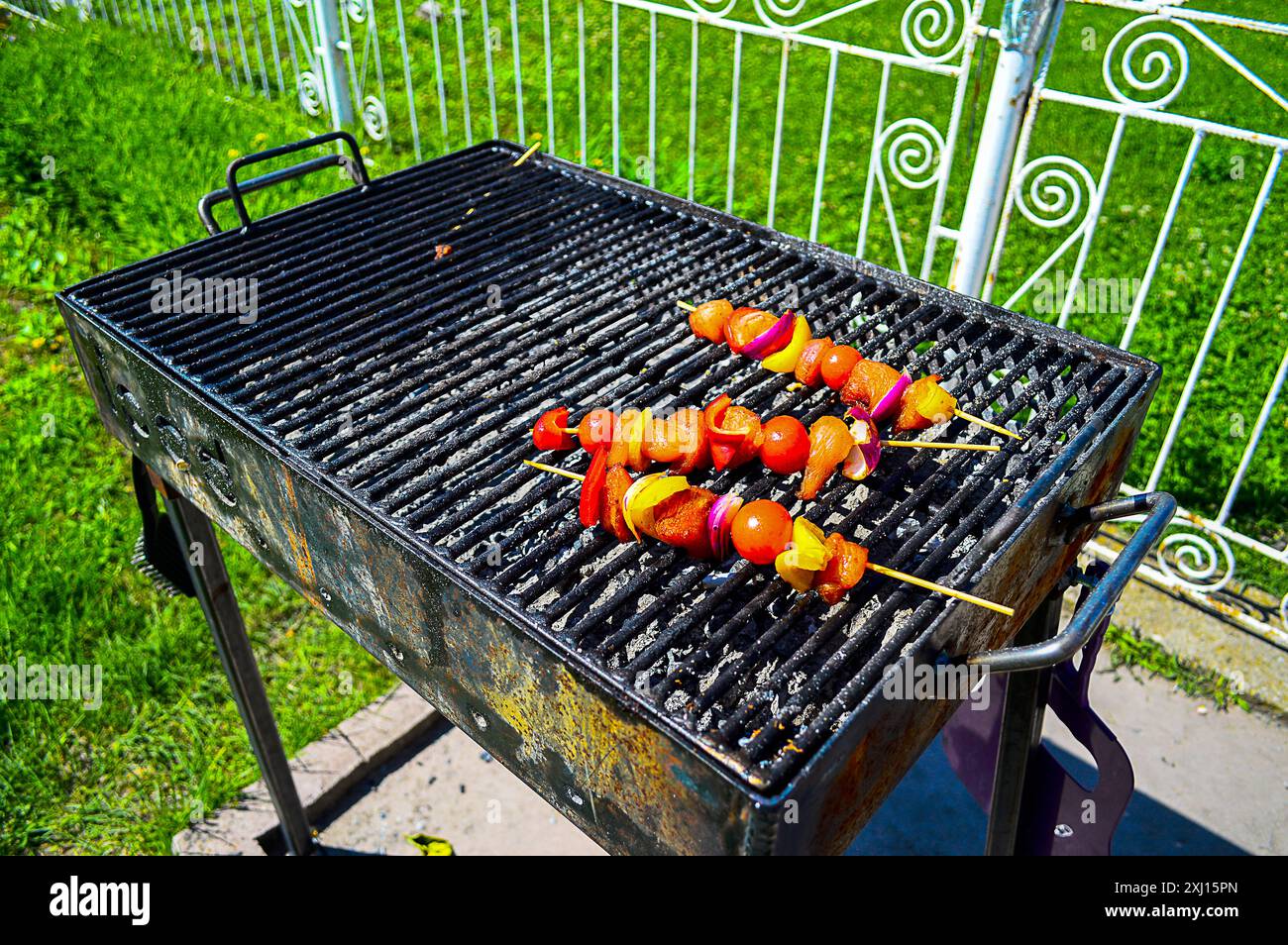 Simple barbecue skewers with meat and vegetables Stock Photo - Alamy