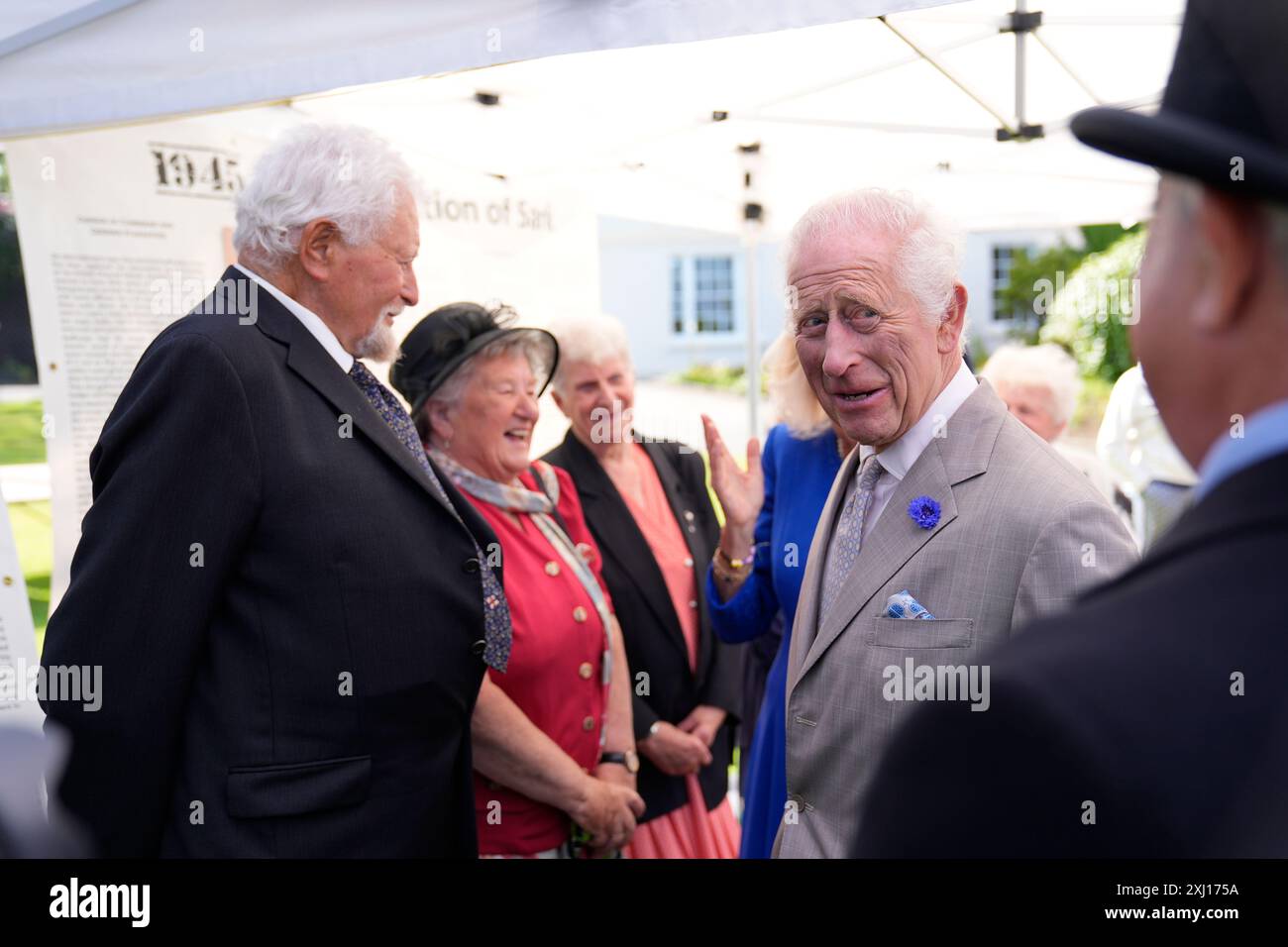 King Charles III during a visit to Les Cotils at L'Hyvreuse, in Saint ...
