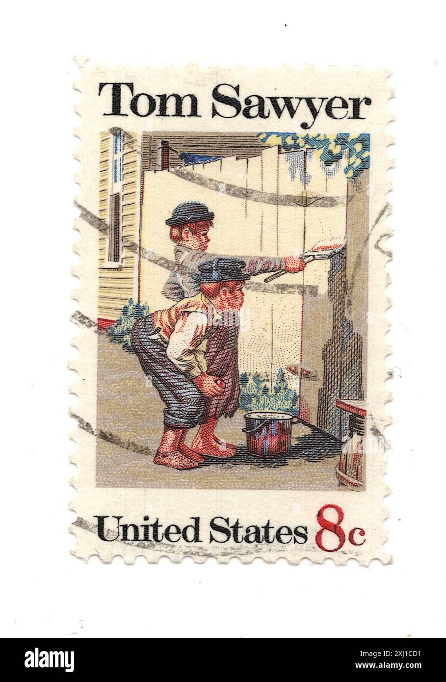 A vintage Tom Sawyer postage stamp from the USA on a white background ...