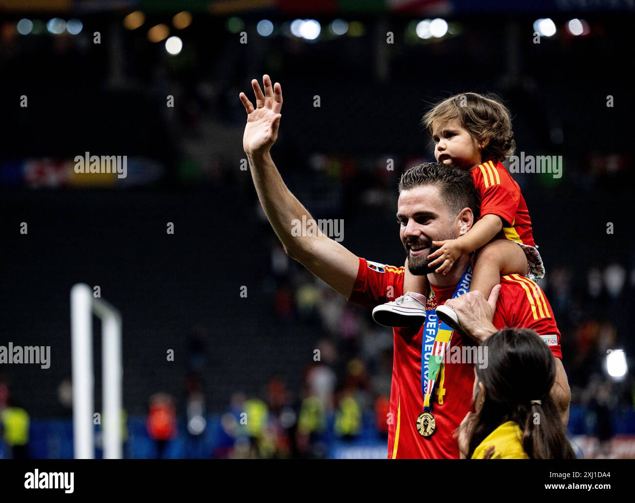 BERLIN, GERMANY - JULY 14: Nacho of Spain celebrates with a kids during ...