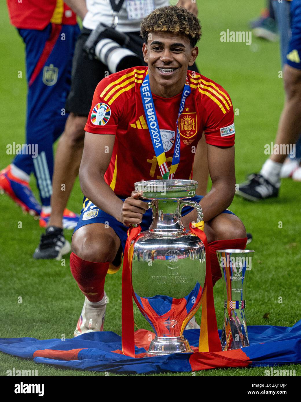 BERLIN, GERMANY - JULY 14: Lamine Yamal of Spain with a trophies during ...
