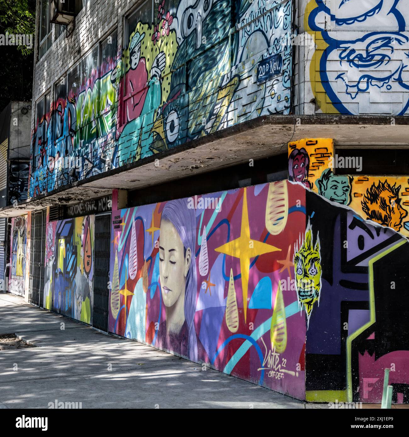 Exterior walls of a building featuring colorful drawings in Cuauhtémoc ...