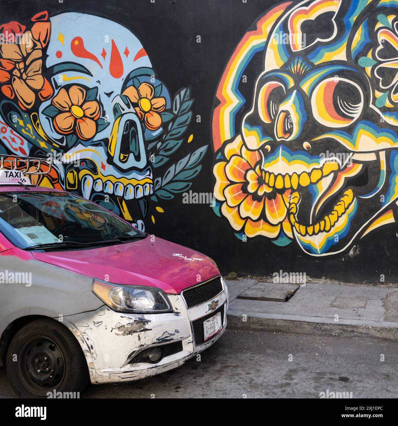 Exterior walls of a building featuring colorful cartoon drawings in ...