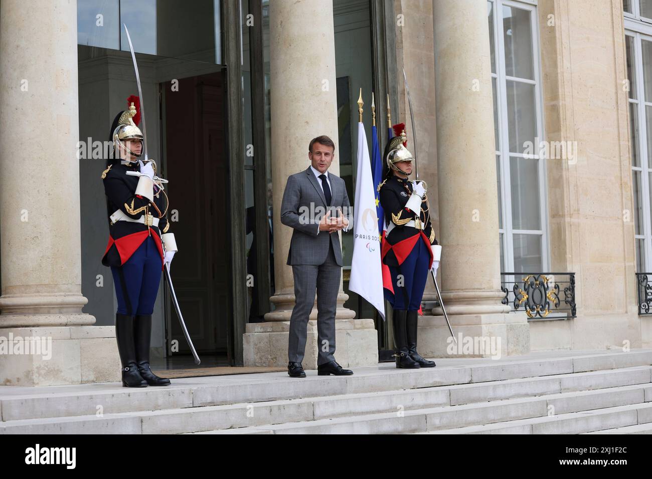 French President Emmanuel Macron waits for International Olympic ...