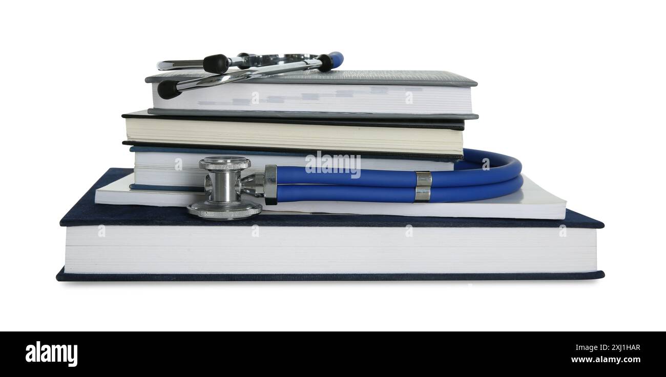 Stethoscope and stack of books isolated on white Stock Photo - Alamy