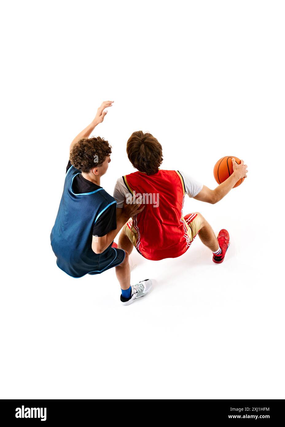 Two young athletes showcasing their skills and determination on court ...