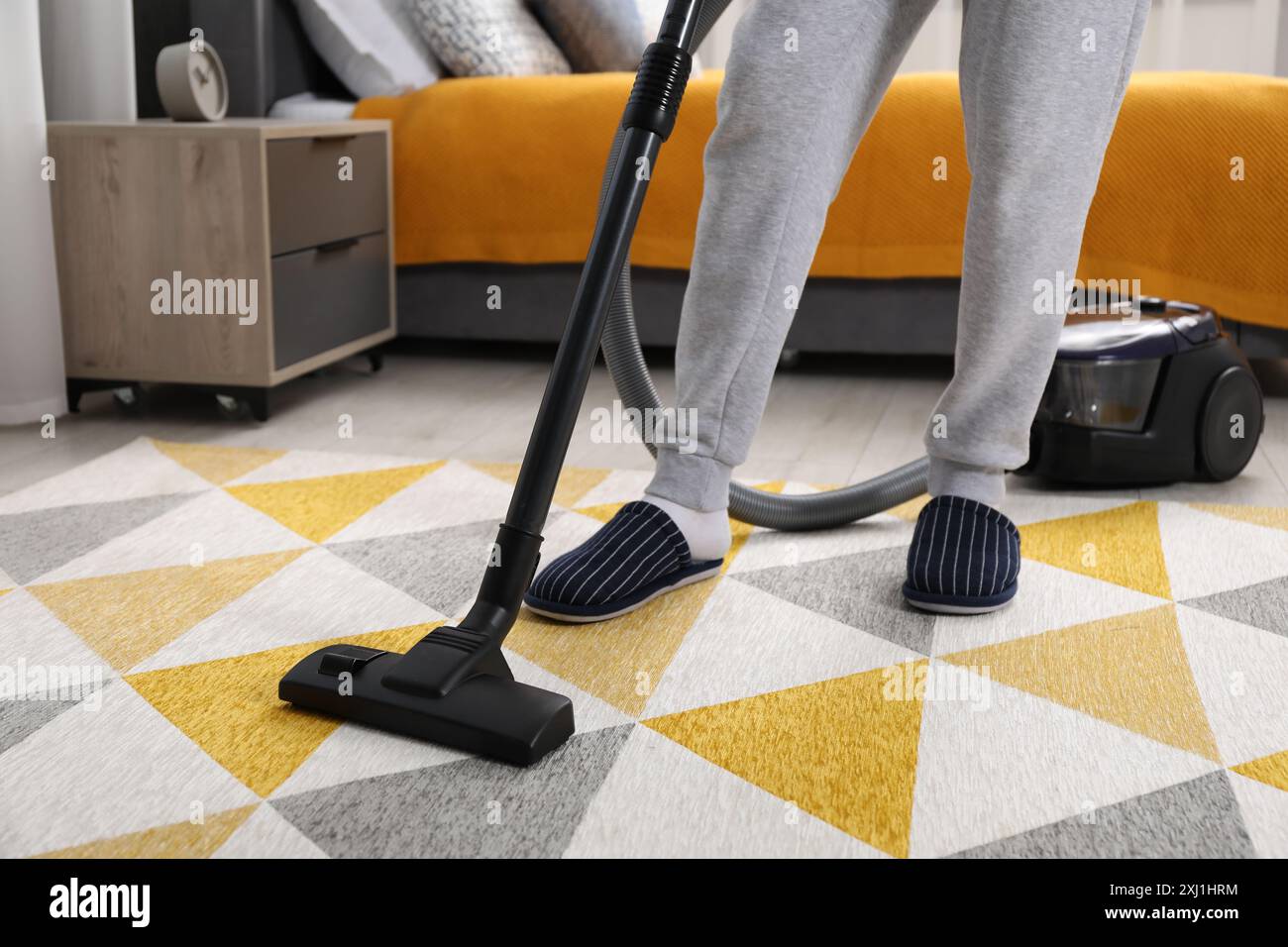 Man vacuuming carpet male cleaning hi-res stock photography and images ...