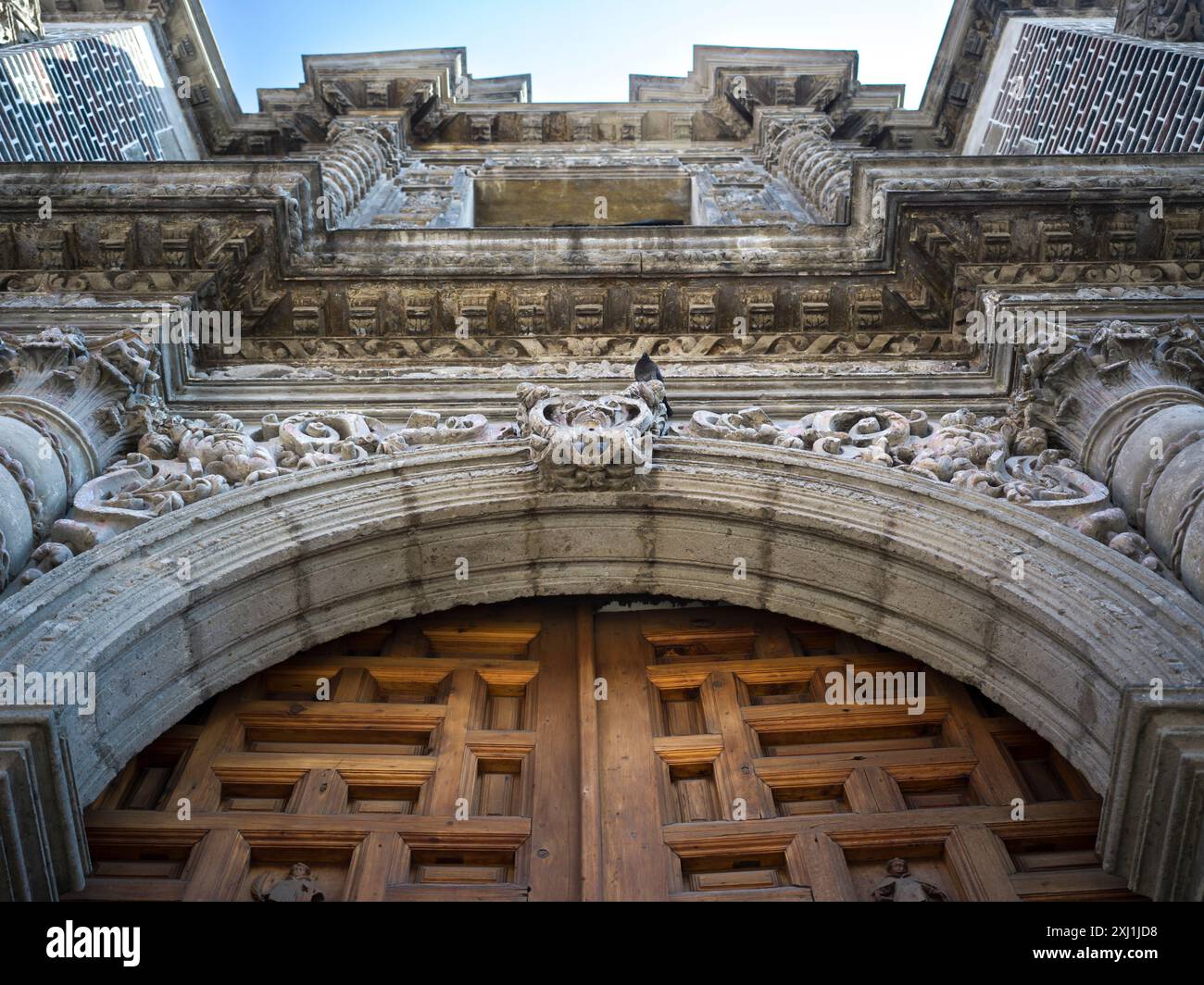 Upward view of elaborate decorative architectural details on the exterior of the Ex Teresa ...