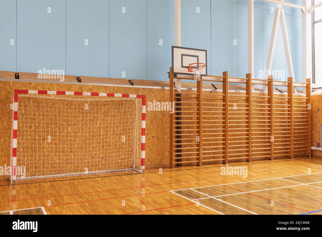Indoor Sports Hall with Basketball Hoop and Soccer Goal in Gymnasium ...