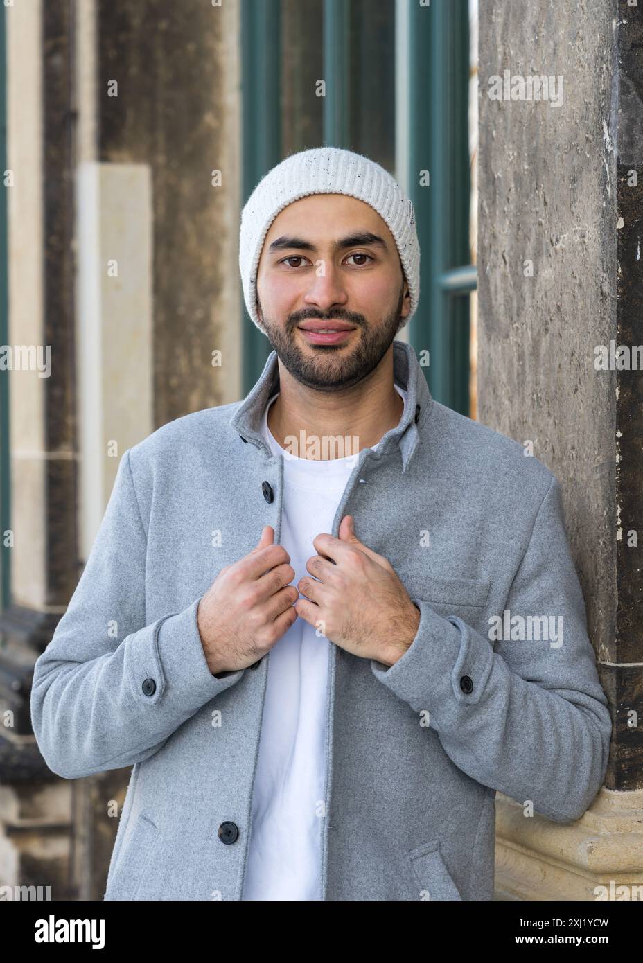 Portrait of a handsome young man. Smiling Asian man with a neat beard ...