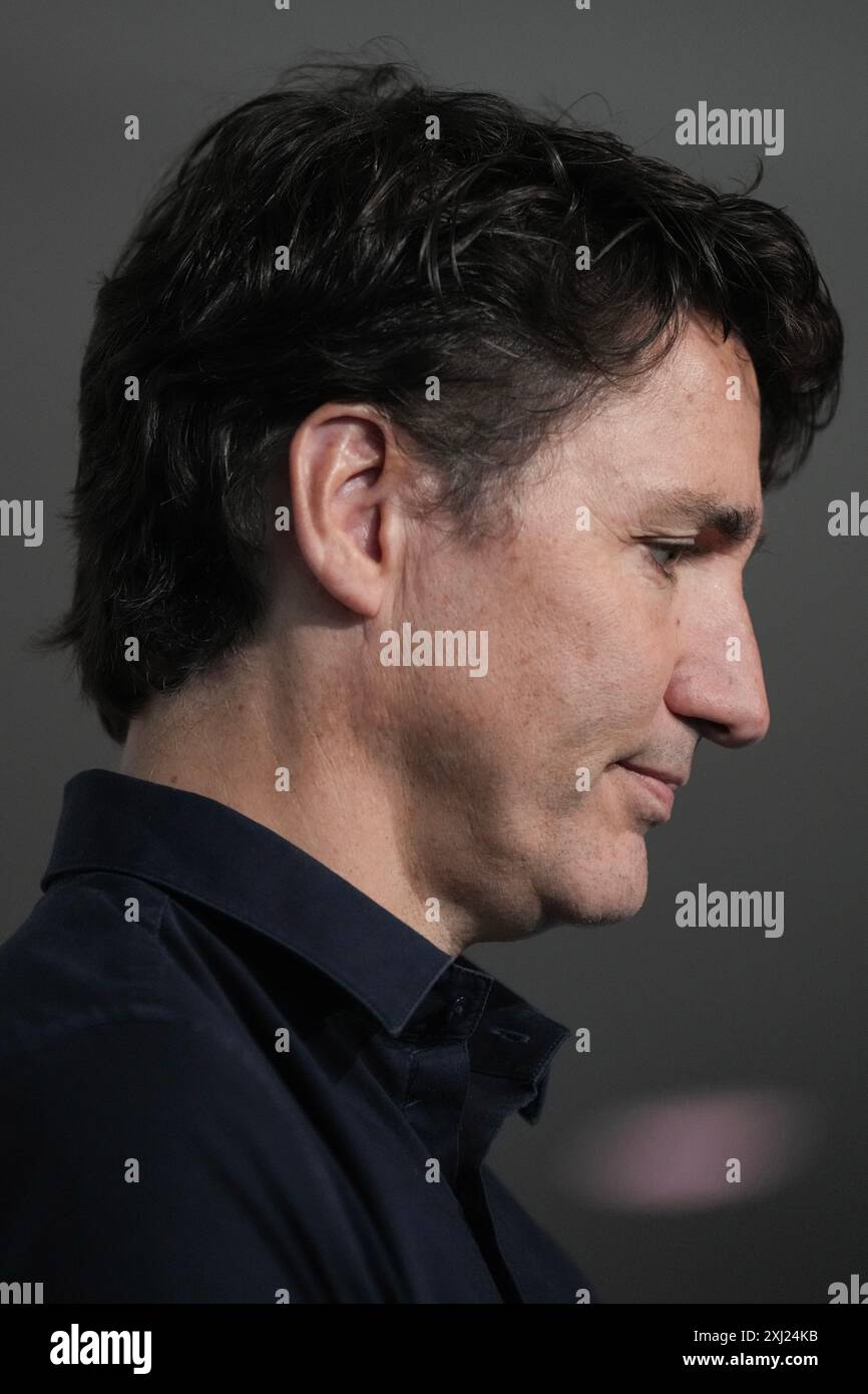 Prime Minister Justin Trudeau listens as Kitchener mayor Berry ...