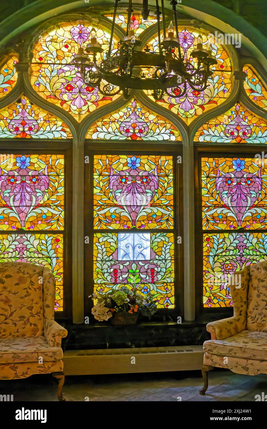 large stained glass window, 2 chairs, chandelier, former Pott's Mansion ...