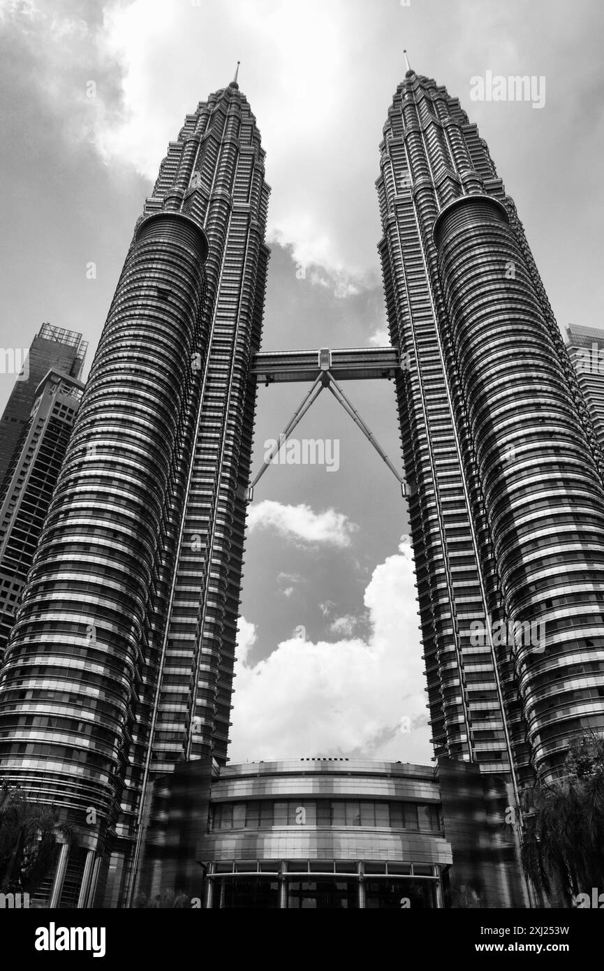 Standing tall and proud, the Petronas Twin Towers pierce the sky in ...
