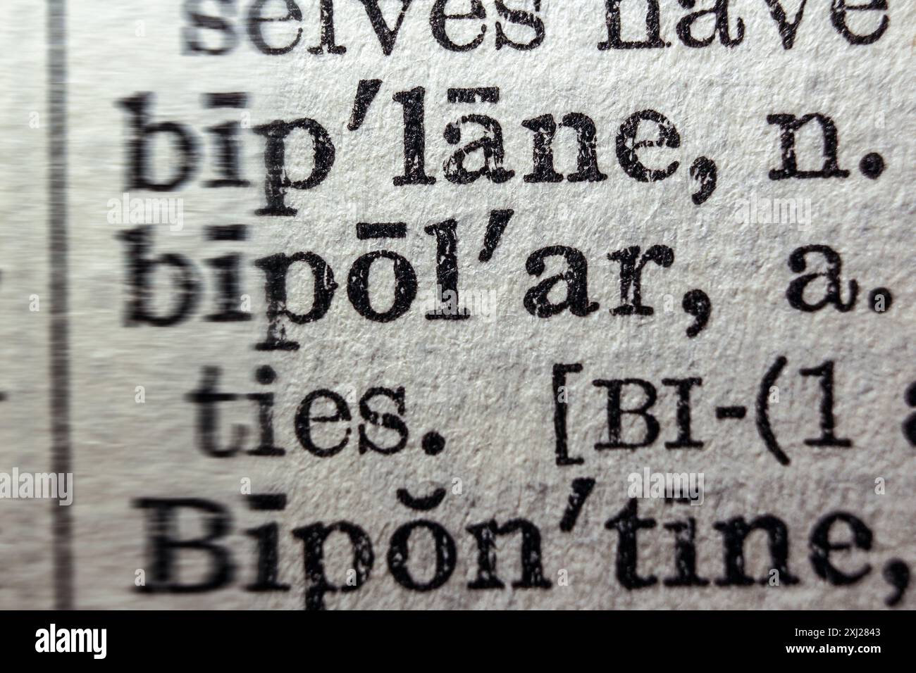 Word bipolar on dictionary page, macro close-up Stock Photo - Alamy