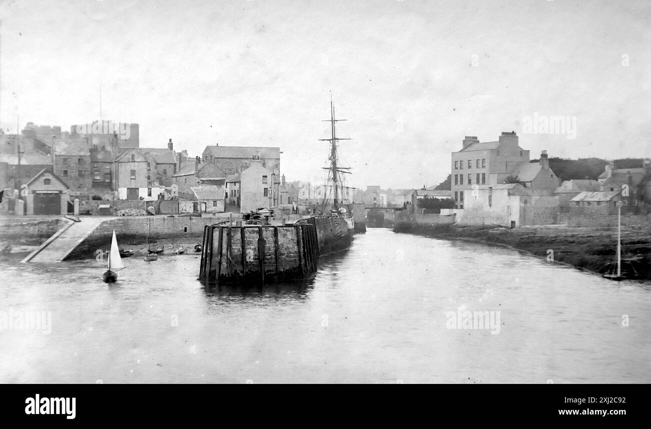 Castletown Harbour, Isle of Man, with many buildings including the ...