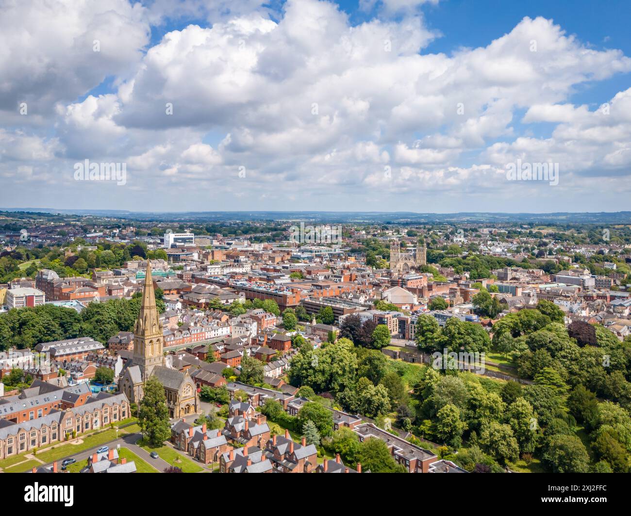 Exeter, UK. 16 July 2024. Sunshine and clouds on a windy day in Exeter ...