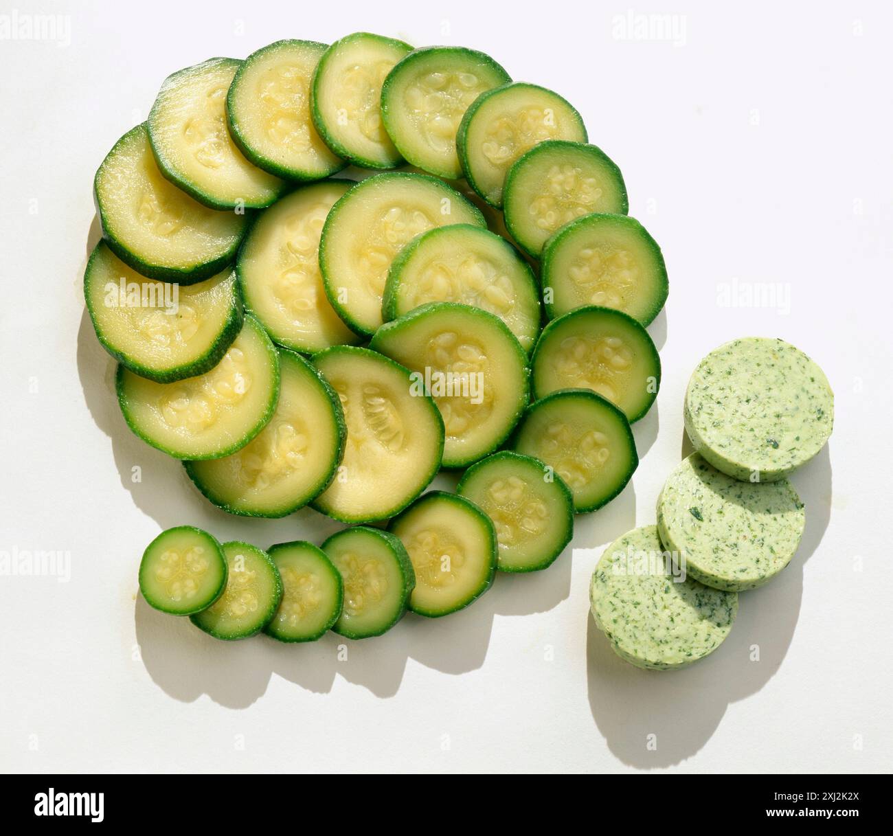 Spiral of courgette round slices Stock Photo - Alamy