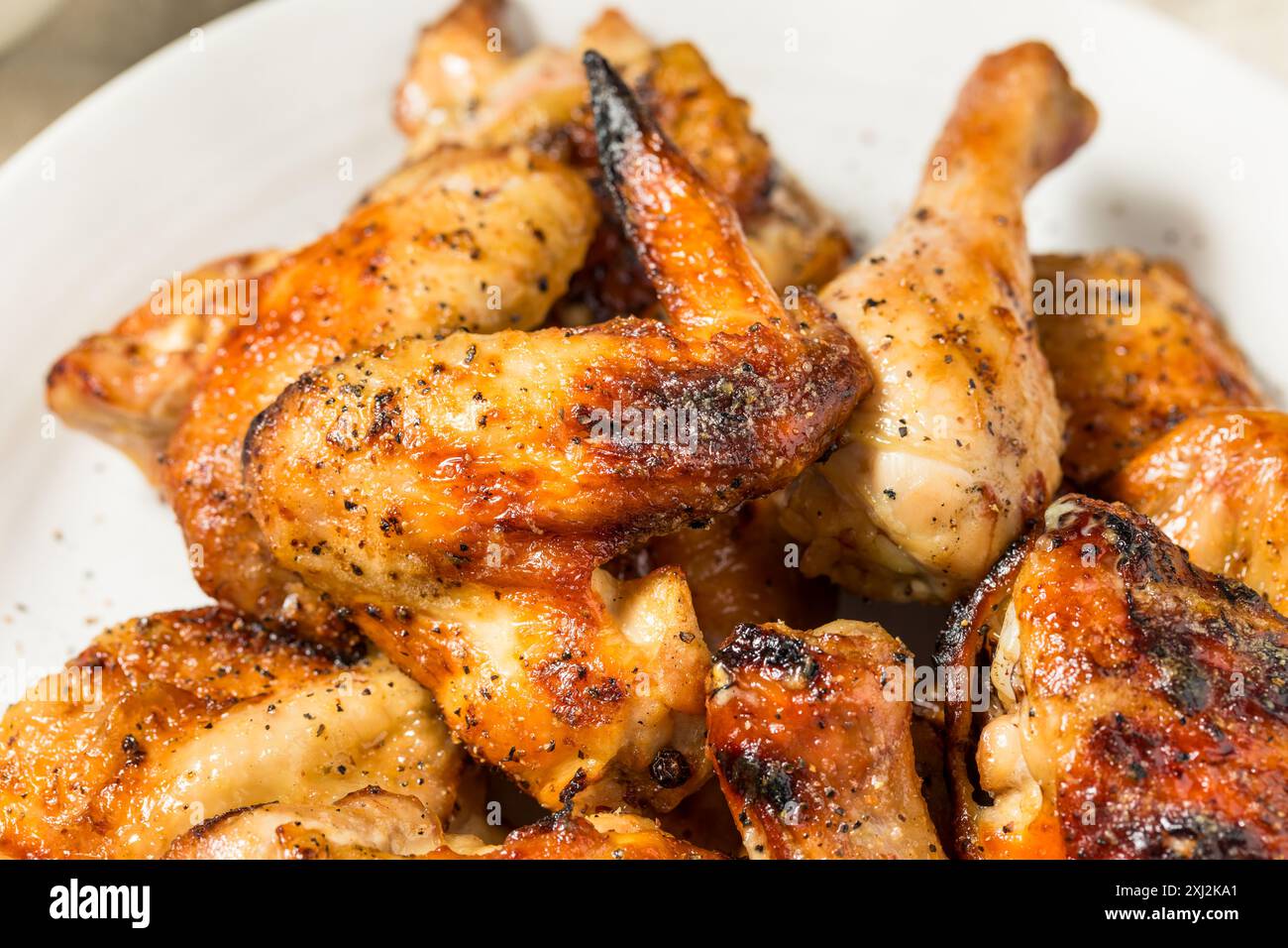 Homemade Barbecued Chicken Wings and Legs with Alabama White Sauce ...