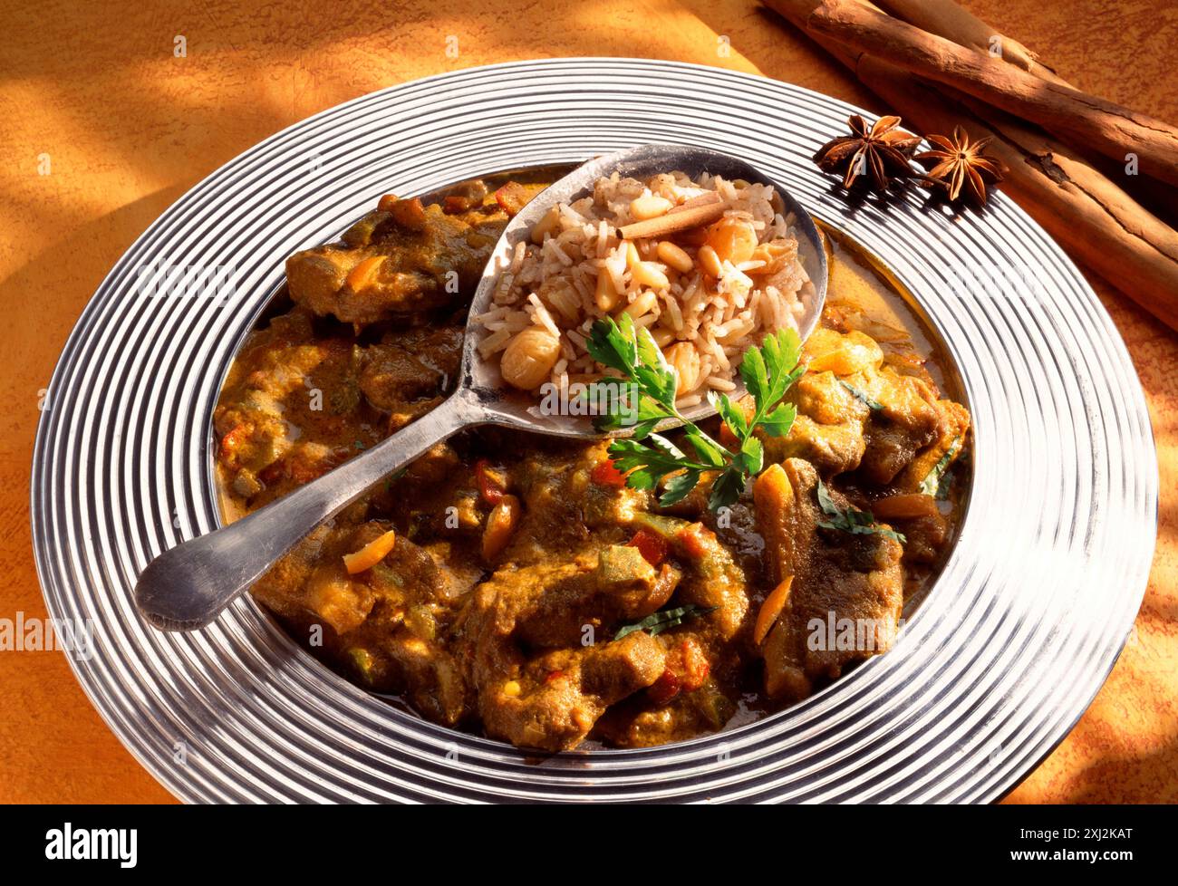 Spicy lamb with Basmati rice Stock Photo - Alamy