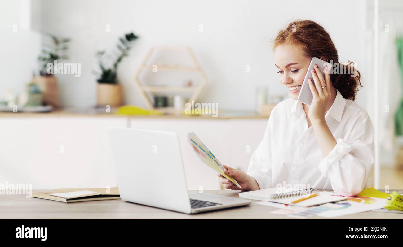 Woman on phone reviewing documents hi-res stock photography and images ...