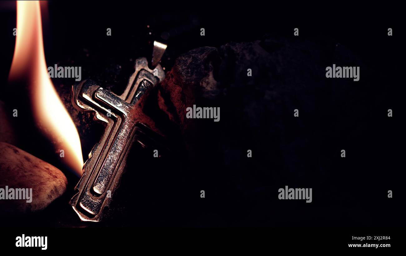 Christianity Religion Symbol Cross in Fire Stock Photo - Alamy