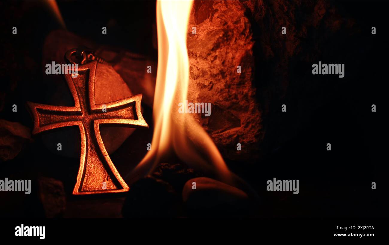Christianity Religion Symbol Cross in Fire Stock Photo - Alamy