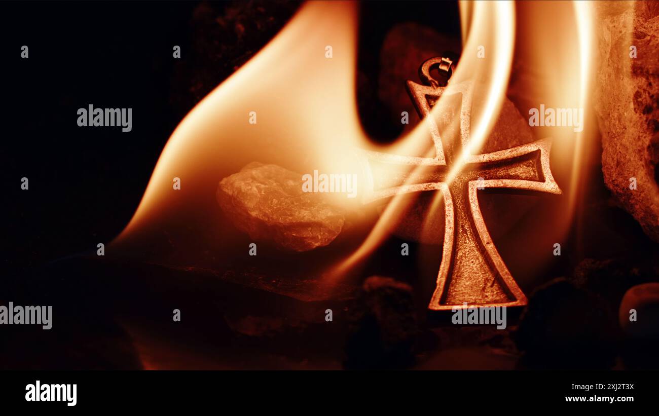 Christianity Religion Symbol Cross in Fire Stock Photo - Alamy