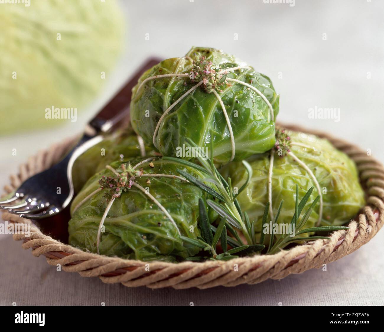 cabbage parcels stuffed with pork, chestnuts and honey Stock Photo - Alamy