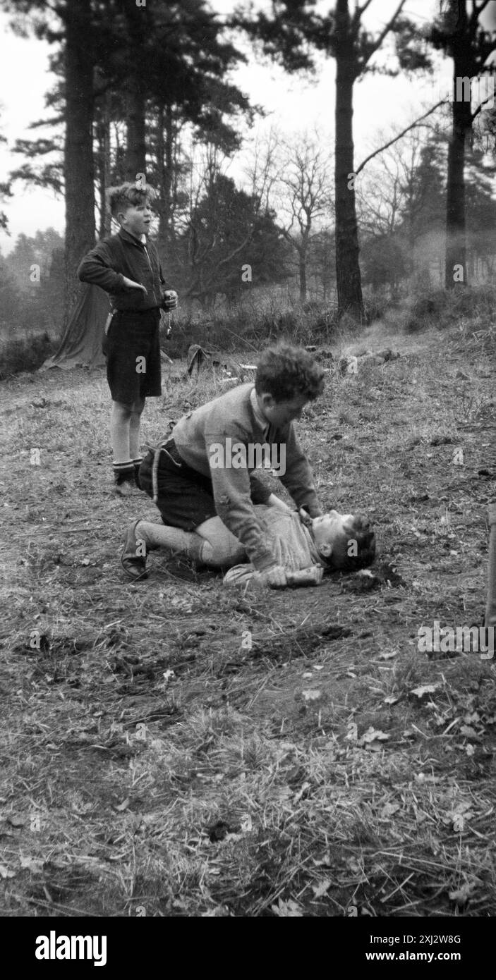 1941, historical, boy scouts playing/fighting? Broadstones, England, UK ...