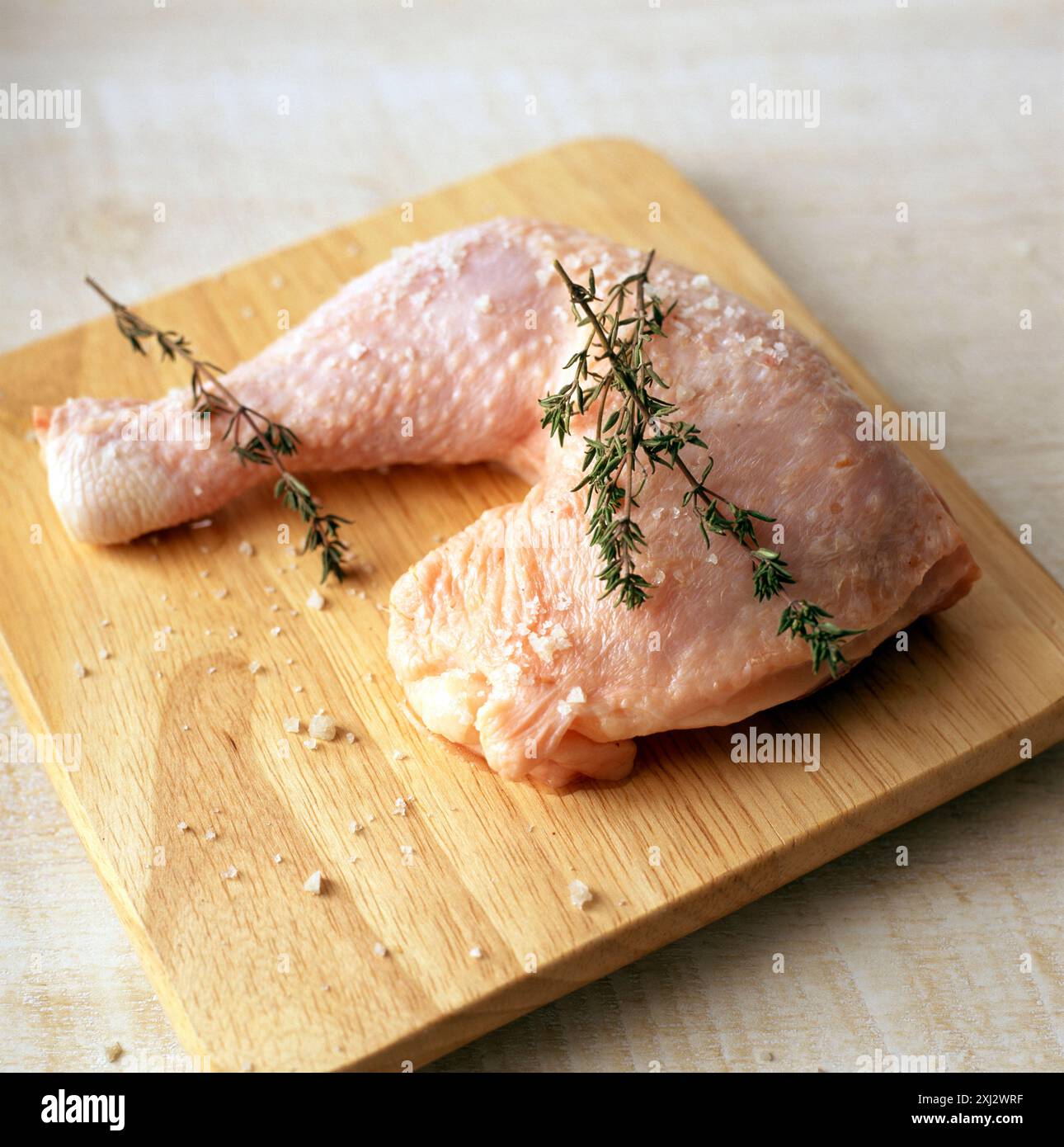 Raw chicken leg Stock Photo - Alamy