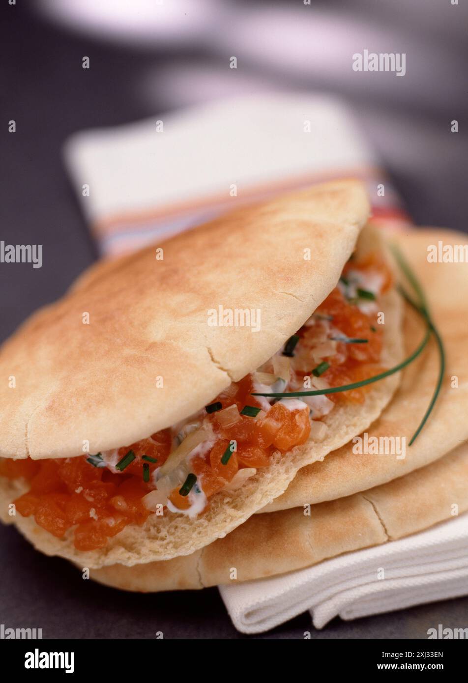 Salmon tartare pitta bread sandwich Stock Photo - Alamy