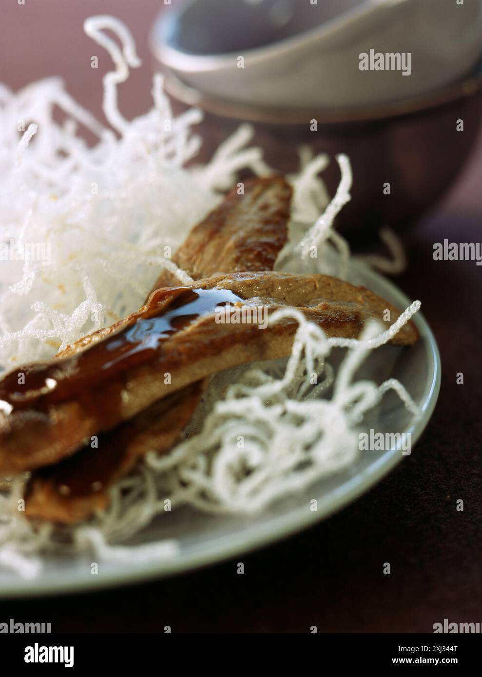 Tea-flavoured duck brochettes Stock Photo - Alamy