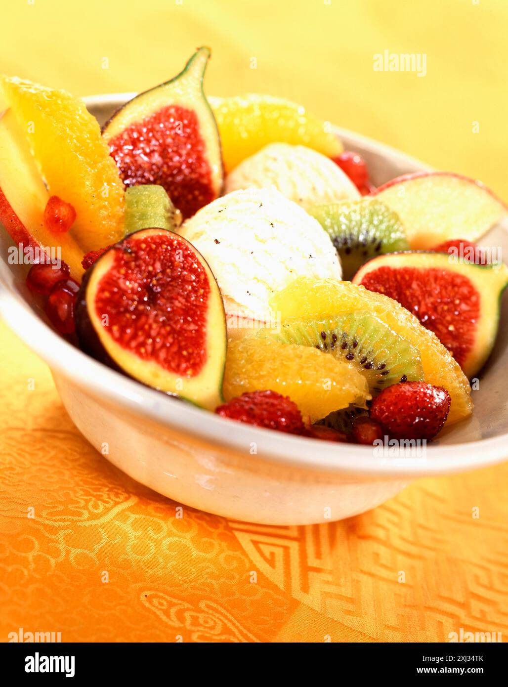 Mixed fruit salad flambé with vanilla ice cream (topic : vanilla ,pure ...