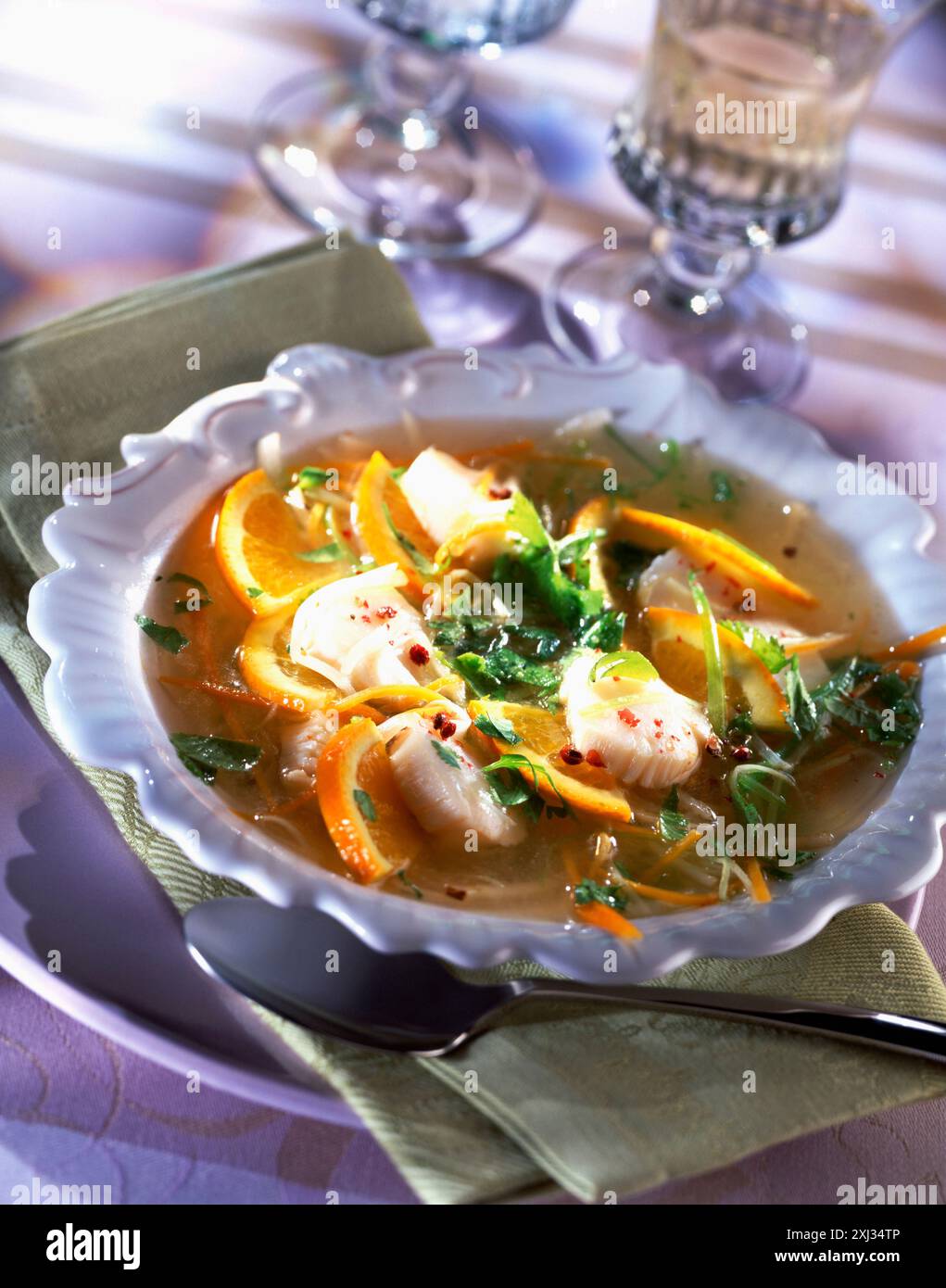 Scallop with orange soup (nage Stock Photo - Alamy