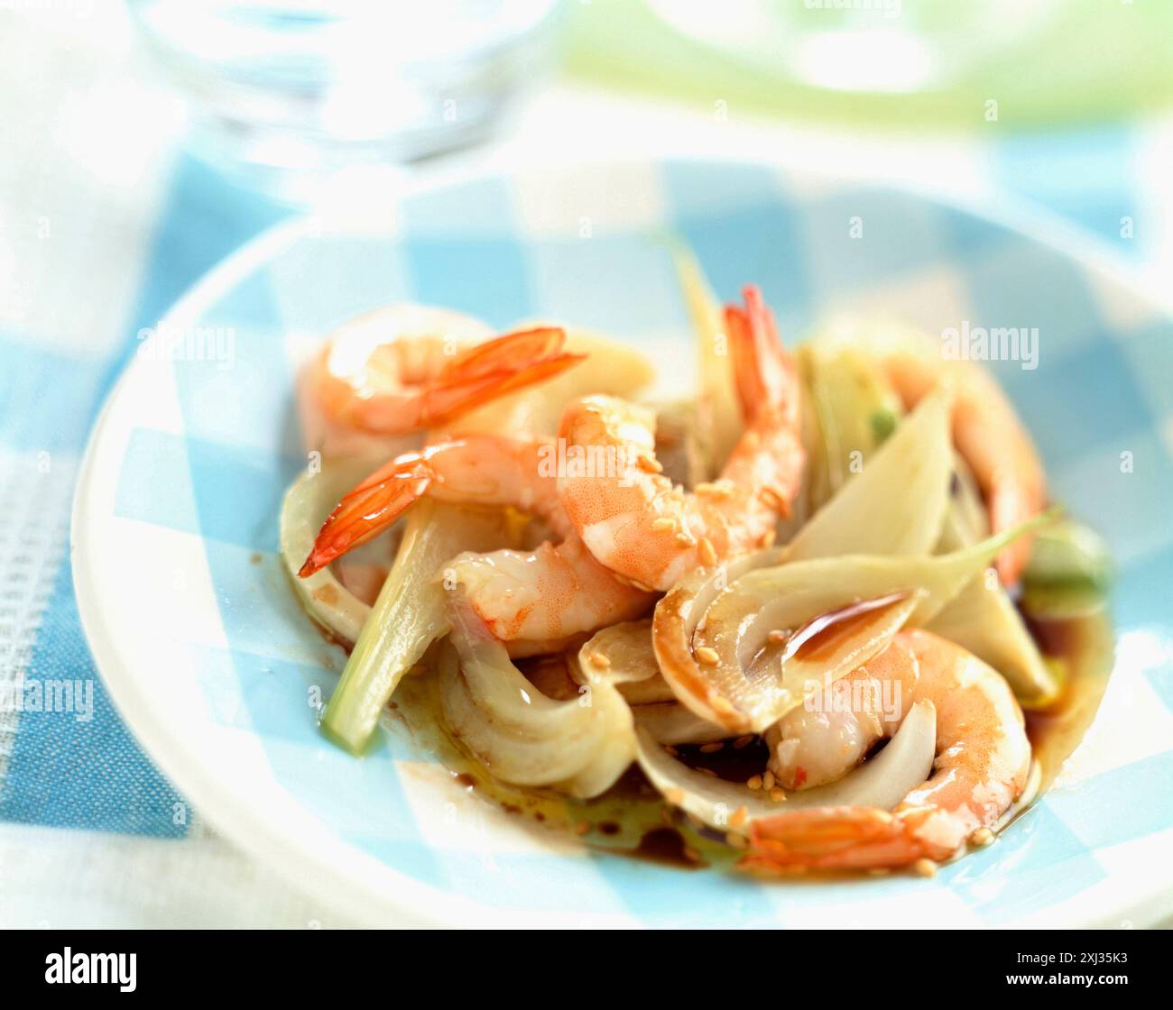 Sautéed prawns with fennel and sesame seeds Stock Photo - Alamy