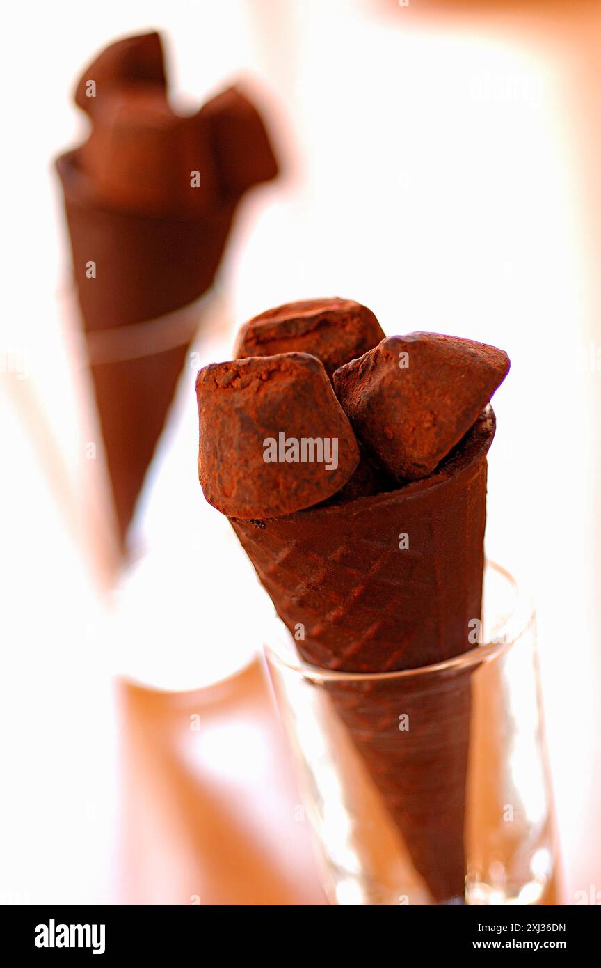chocolate cornets with truffles Stock Photo - Alamy