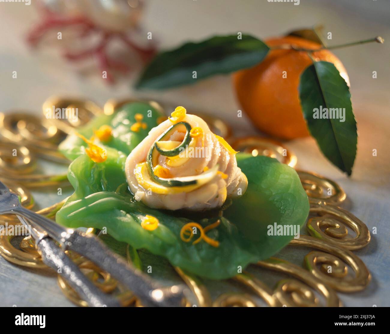 Rolled sole fillets with citus fruit Stock Photo - Alamy